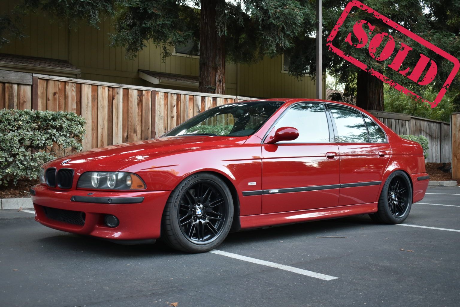 Imola Red 2002 BMW E39 M5 - motorsportsmgmt.com